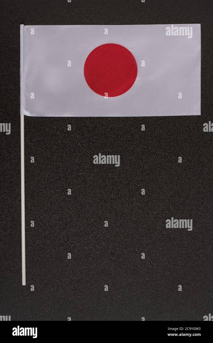 Japan flag on black background. National symbols of country of rising ...