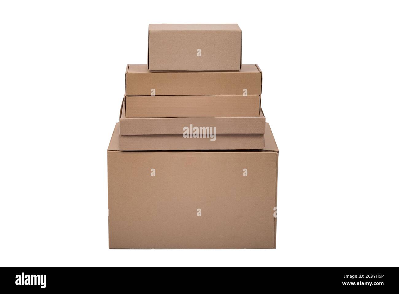 Cardboard boxes are standing on each other isolated on white background ...
