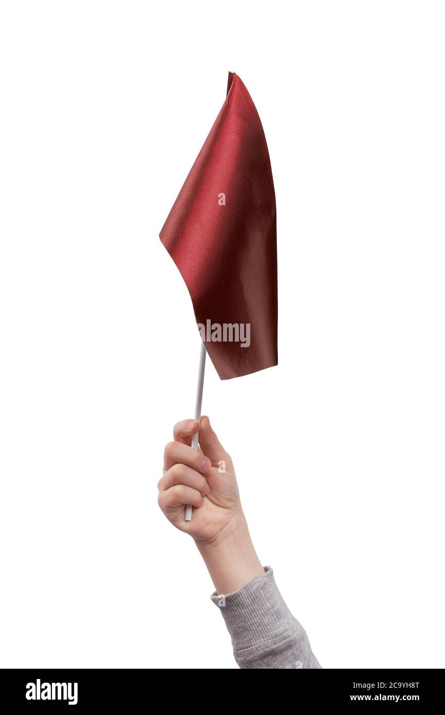 Childrens hand holding red flag isolated on white background Stock ...