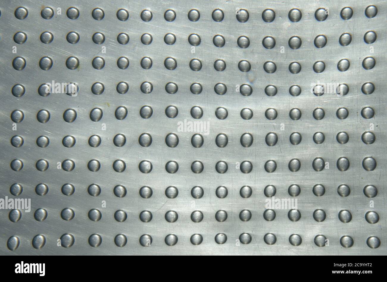 Gray metallic background: stainless steel pool floor with distorted ...