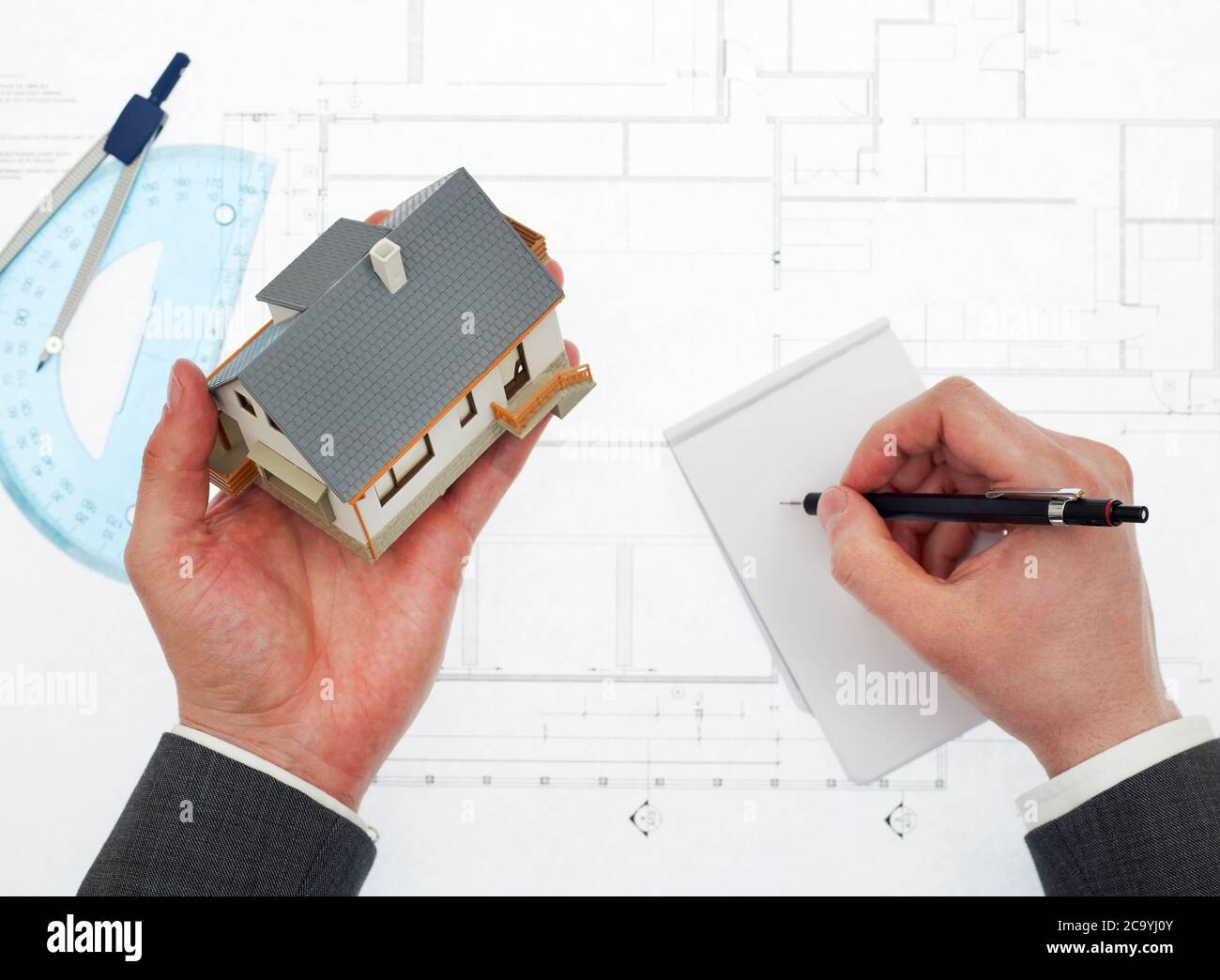 Architect taking notes Stock Photo - Alamy
