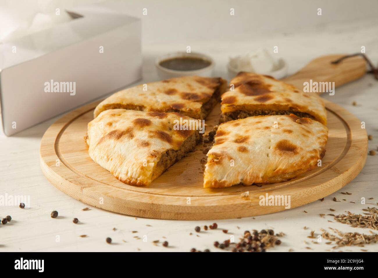 Stuffed qeema minced meat naan with herbs and spices and white butter ...