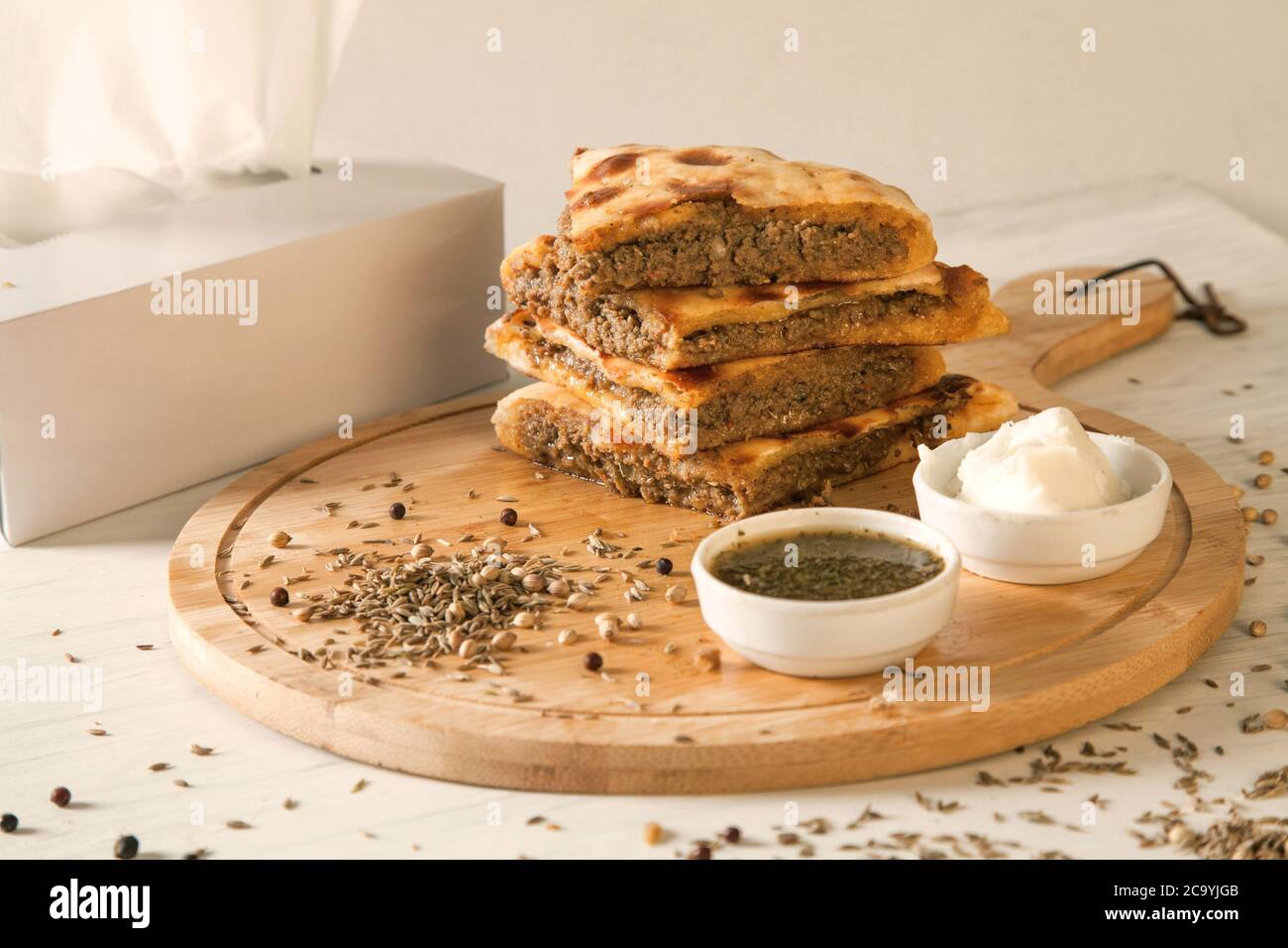 Stuffed qeema minced meat naan with herbs and spices and white butter ...