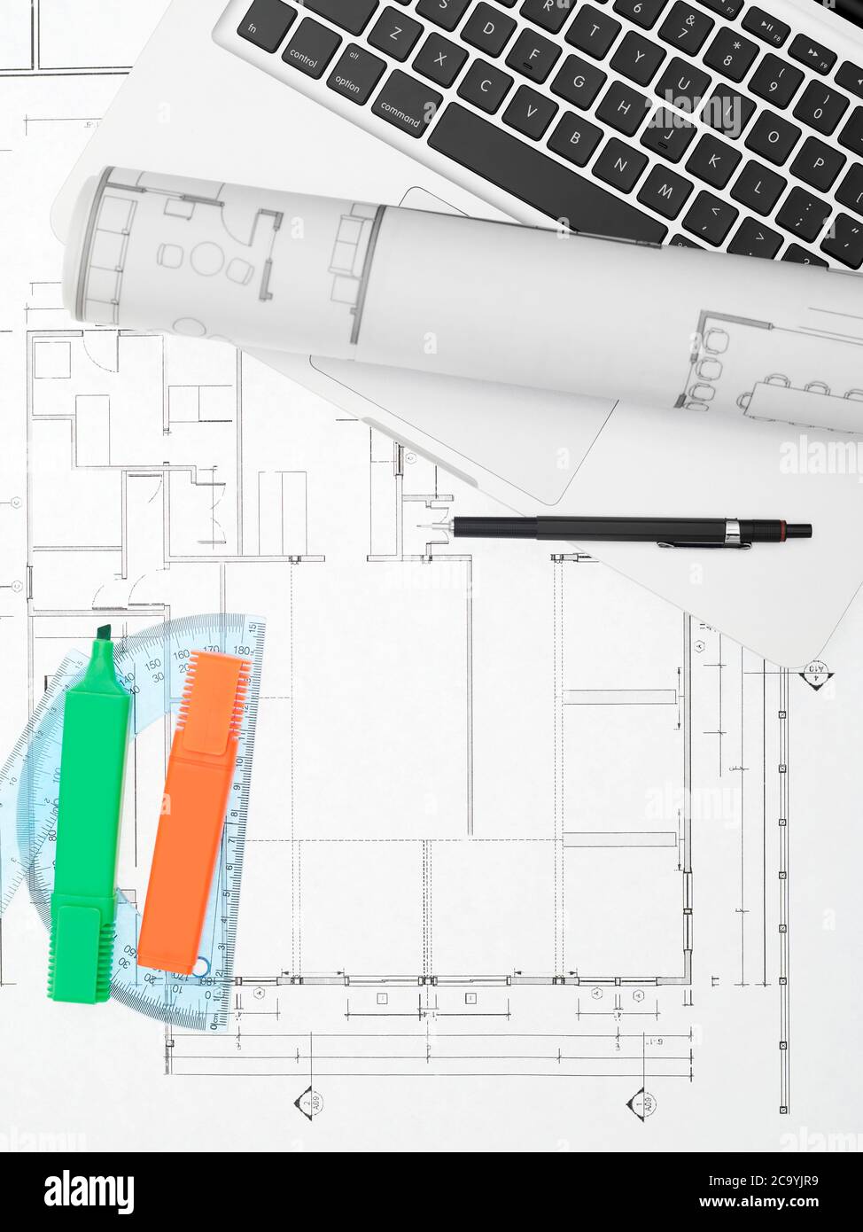 Blueprints and laptop view from above Stock Photo - Alamy