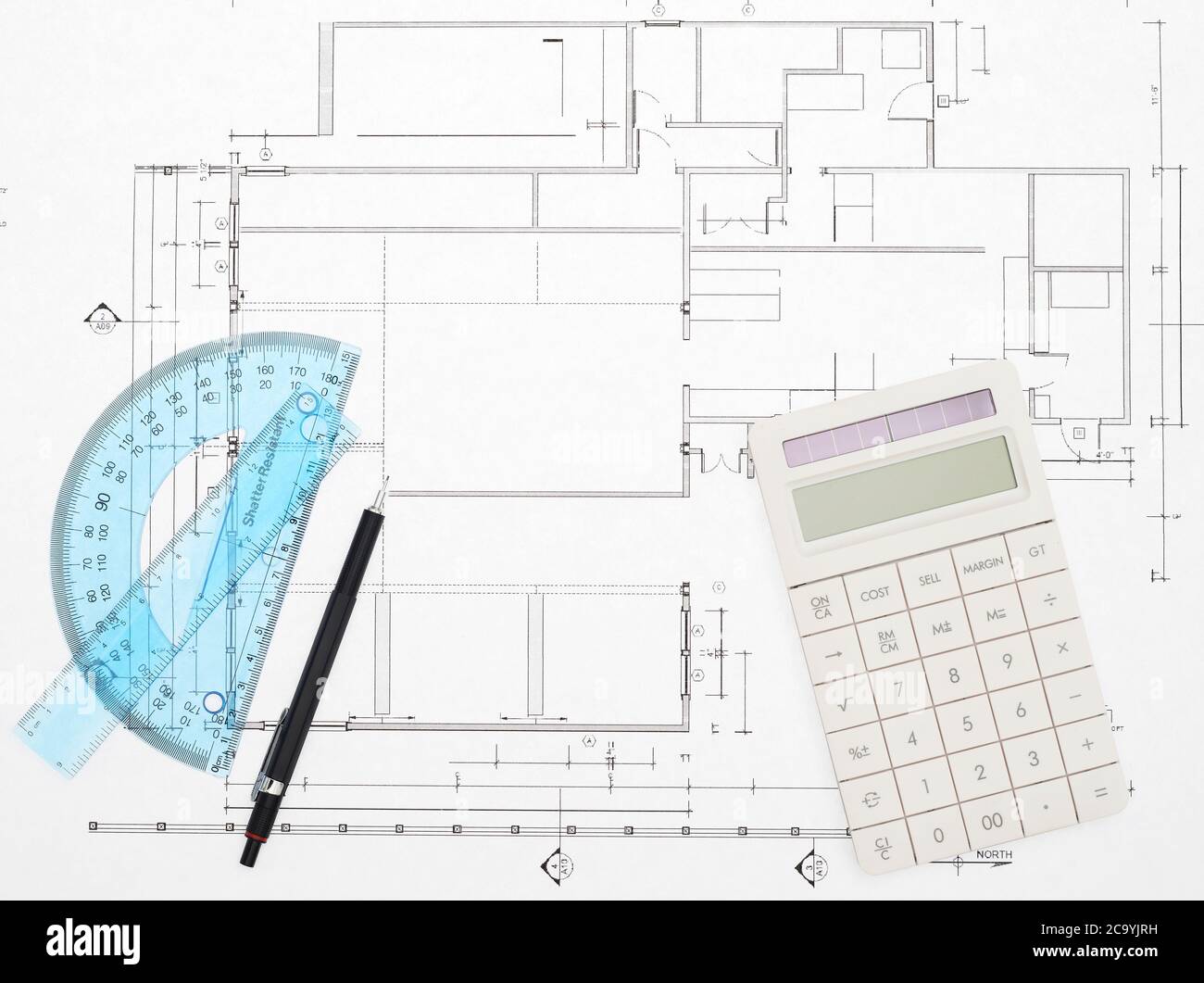 Rulers, calculator and blueprint Stock Photo - Alamy