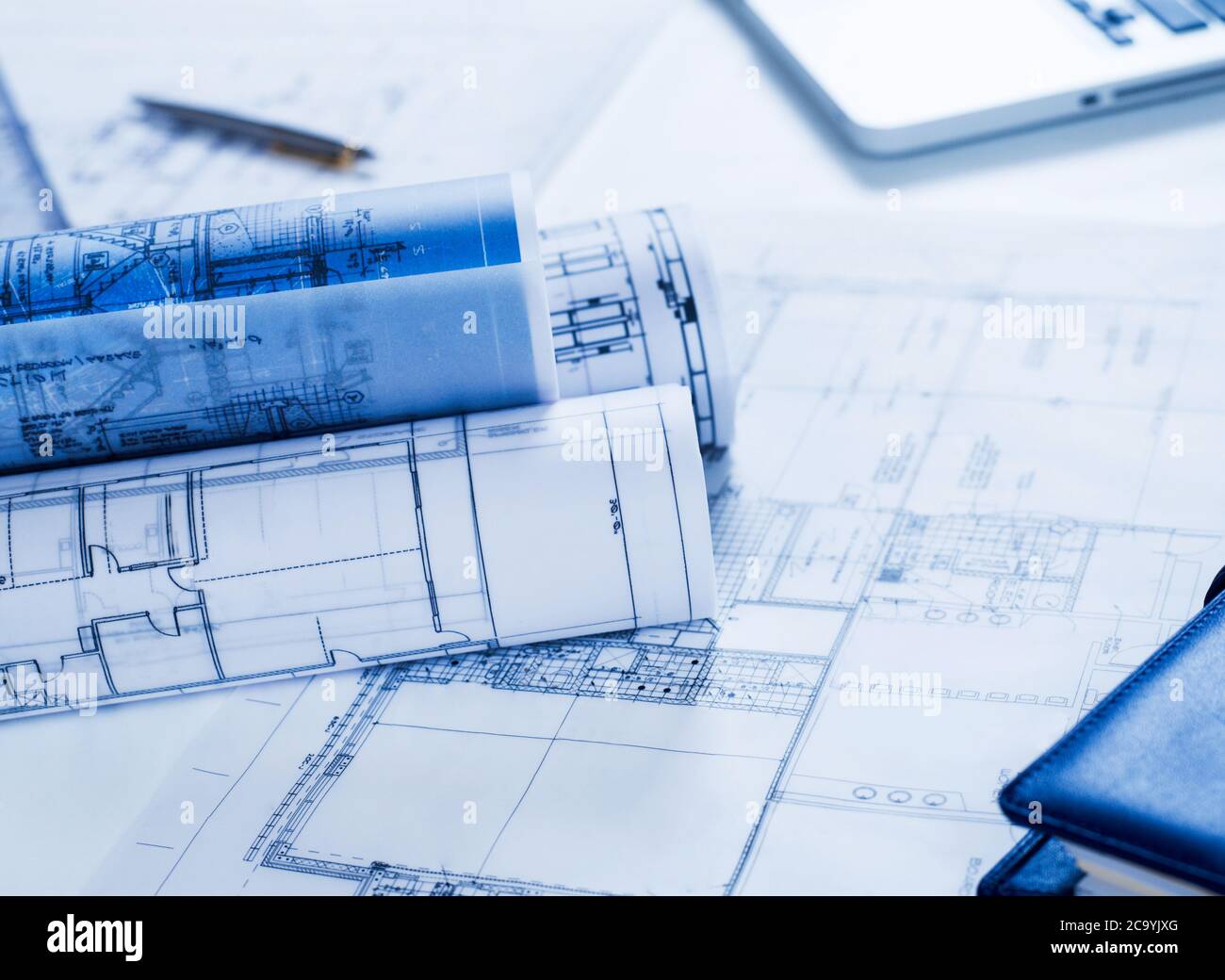 Blueprints on desk Stock Photo - Alamy