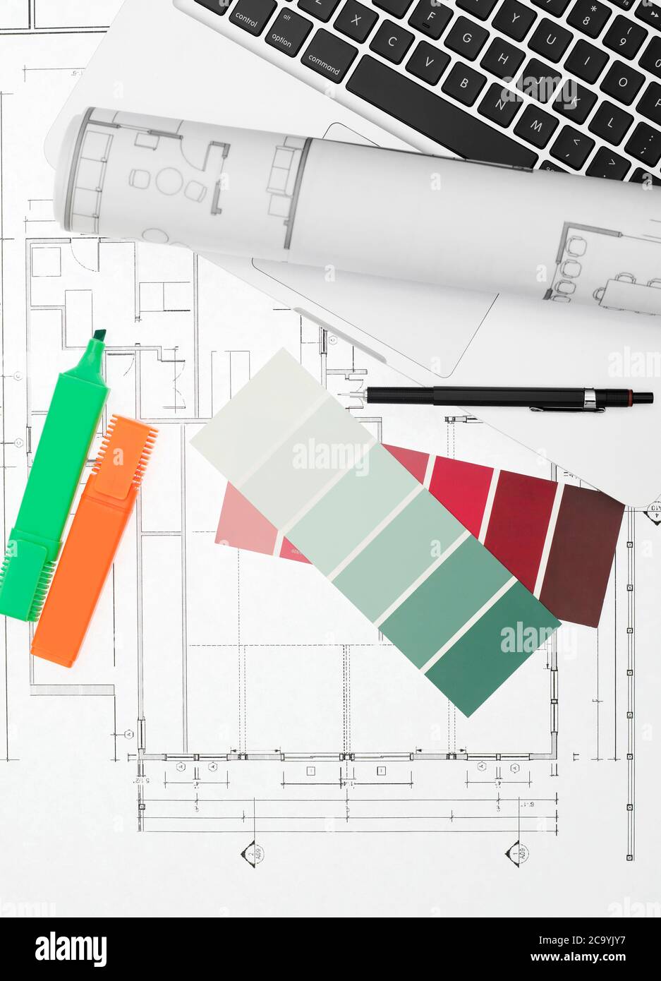 Blueprints, color swatches and laptop Stock Photo - Alamy