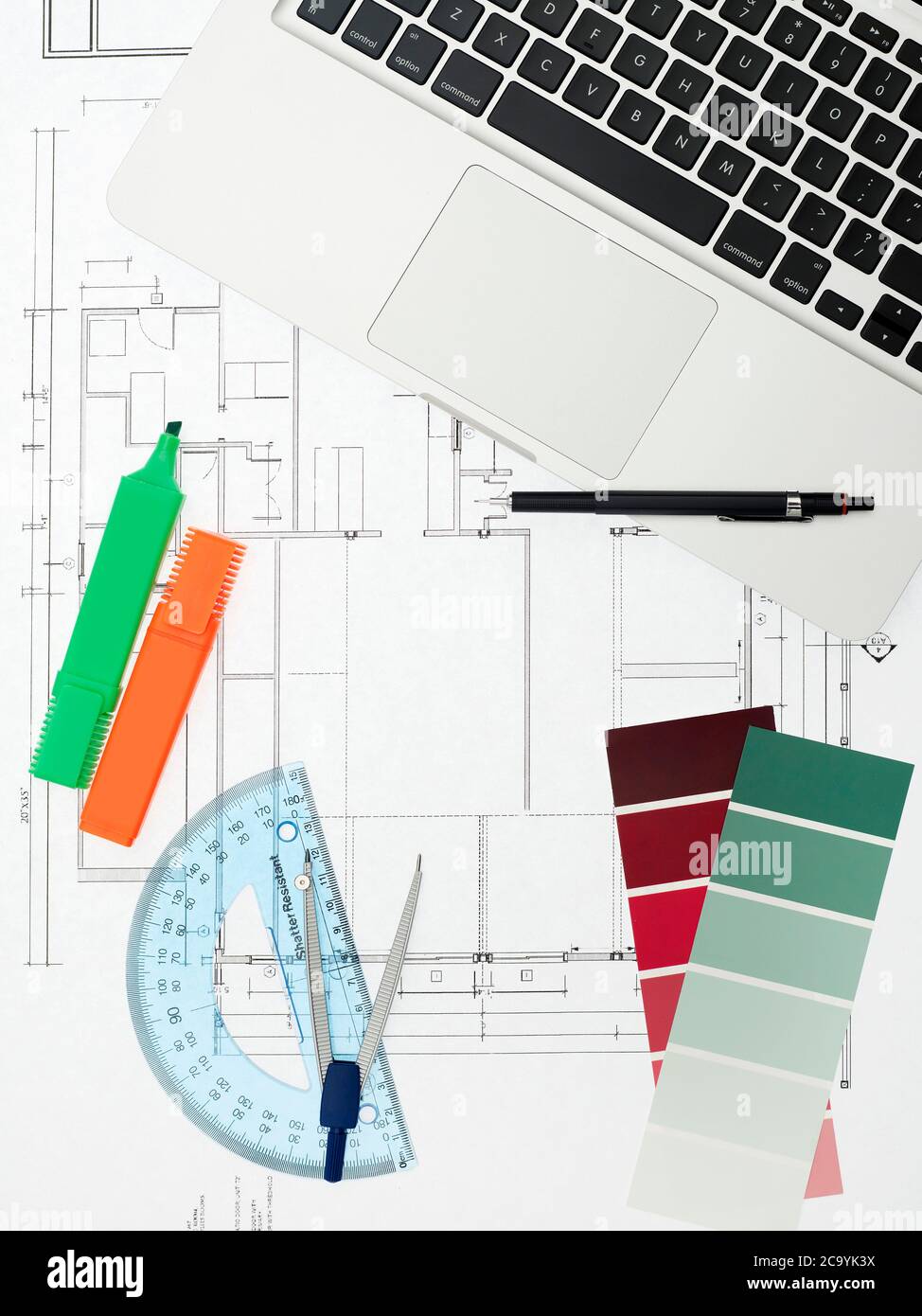 Blueprints, color swatches and laptop Stock Photo - Alamy