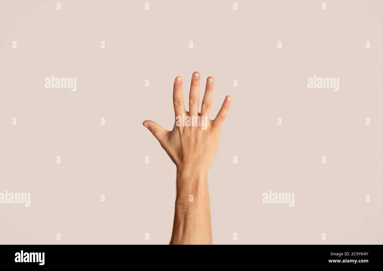 Open hand showing five fingers hi-res stock photography and images - Alamy
