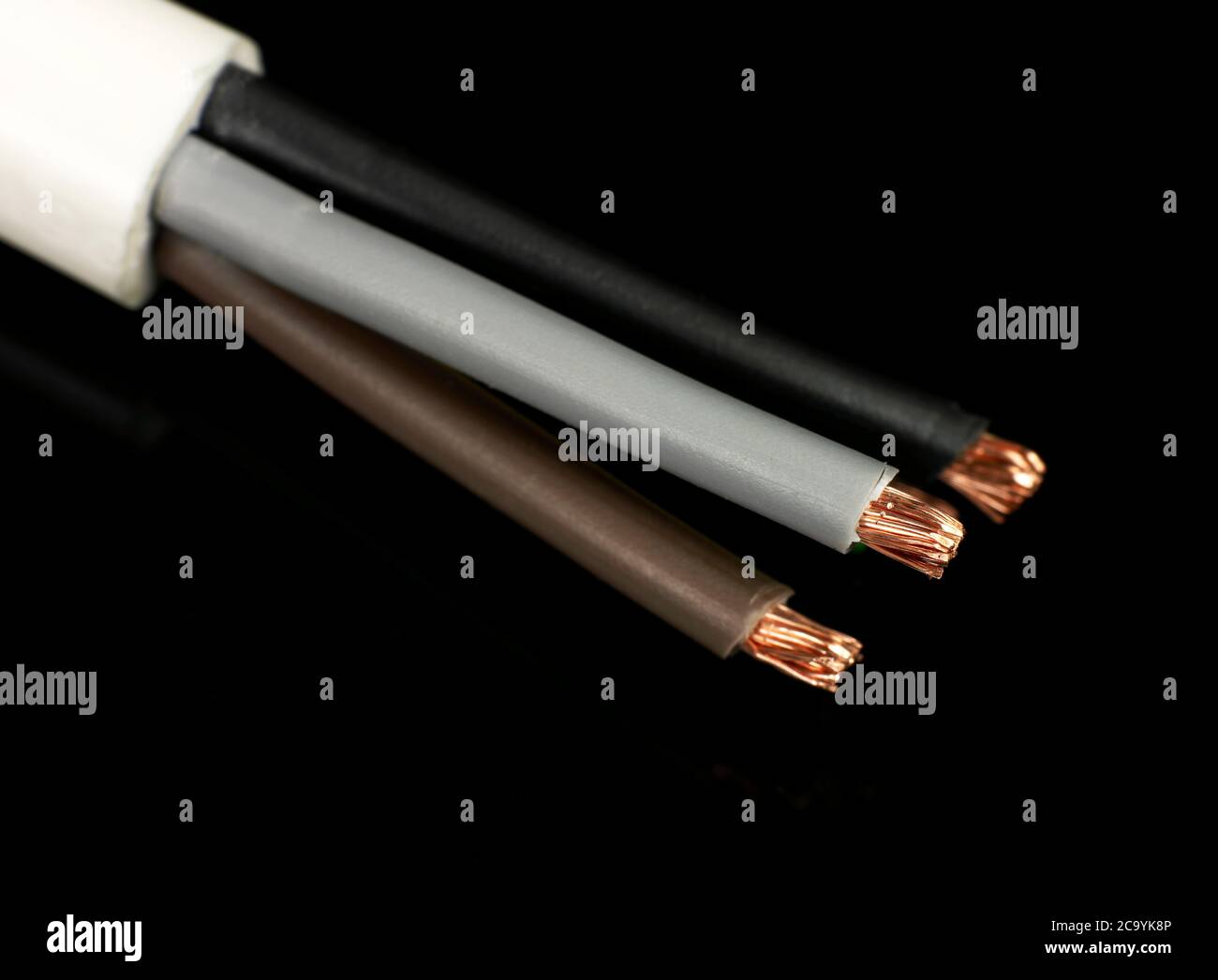 Cable isolated on black Stock Photo - Alamy