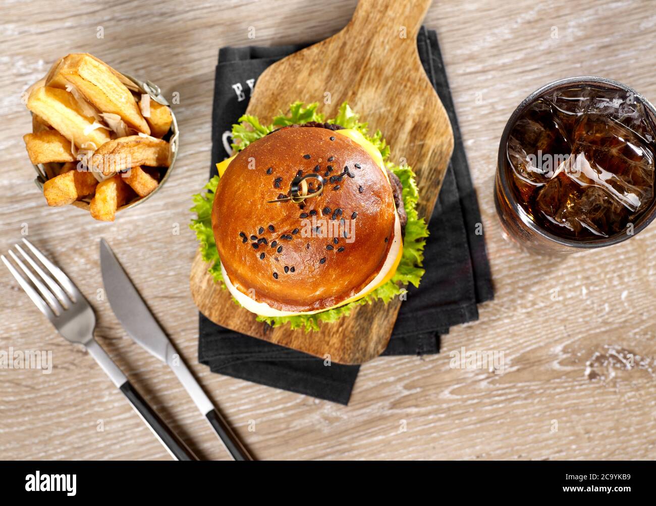 Cheeseburger with cola Stock Photo - Alamy