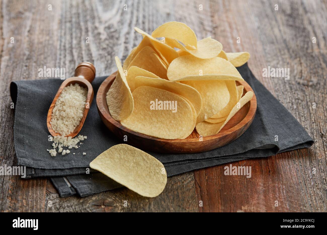 Potato chips on table Stock Photo - Alamy