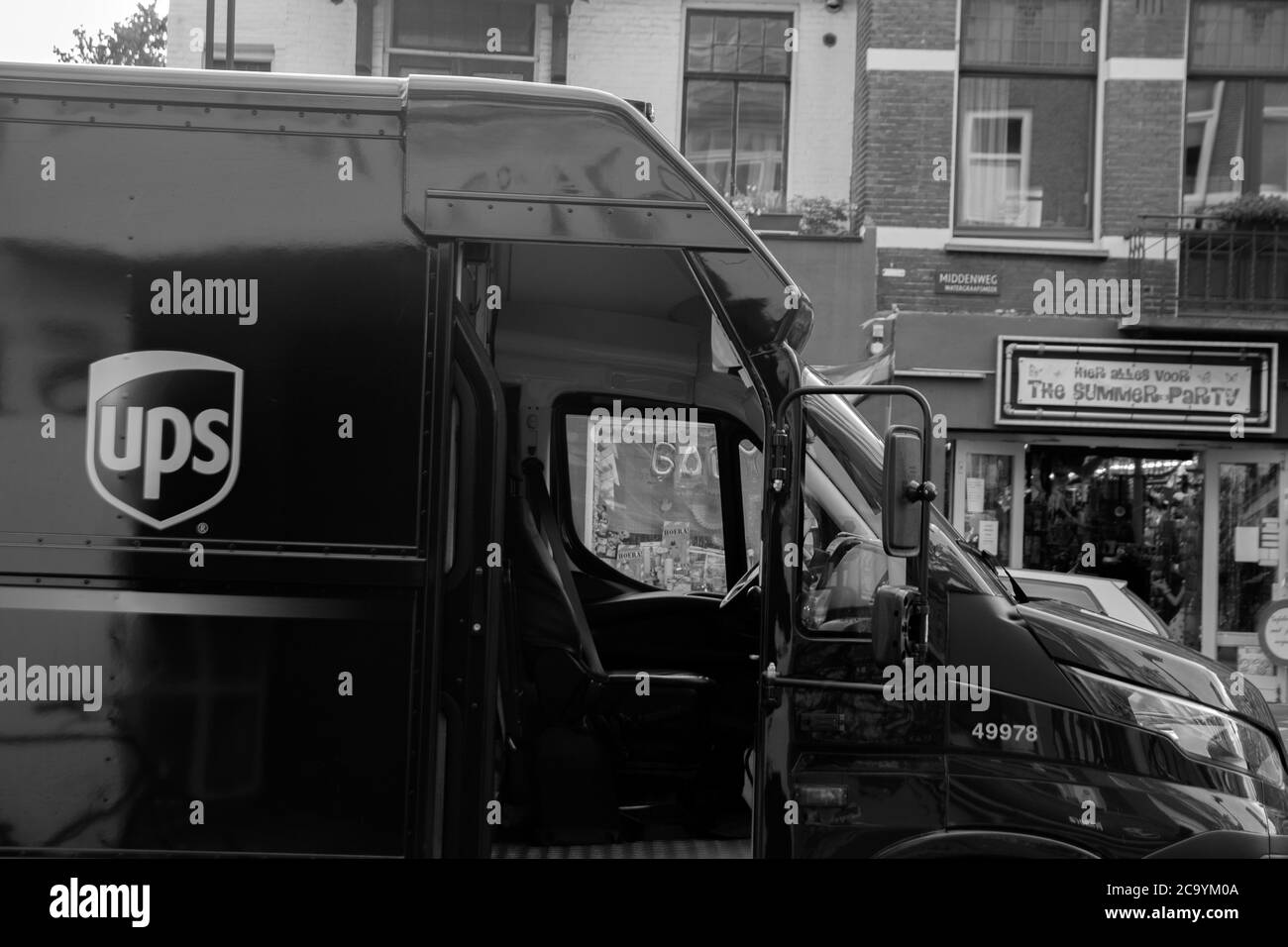 Ups parcel delivery truck Black and White Stock Photos & Images - Alamy