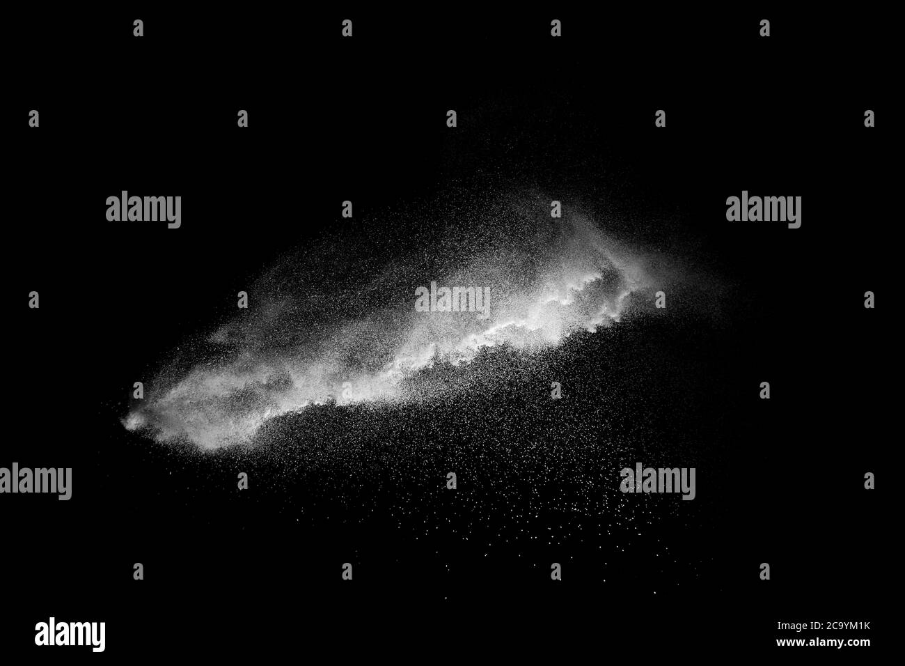 White talcume powder explosion on black background. White dust ...