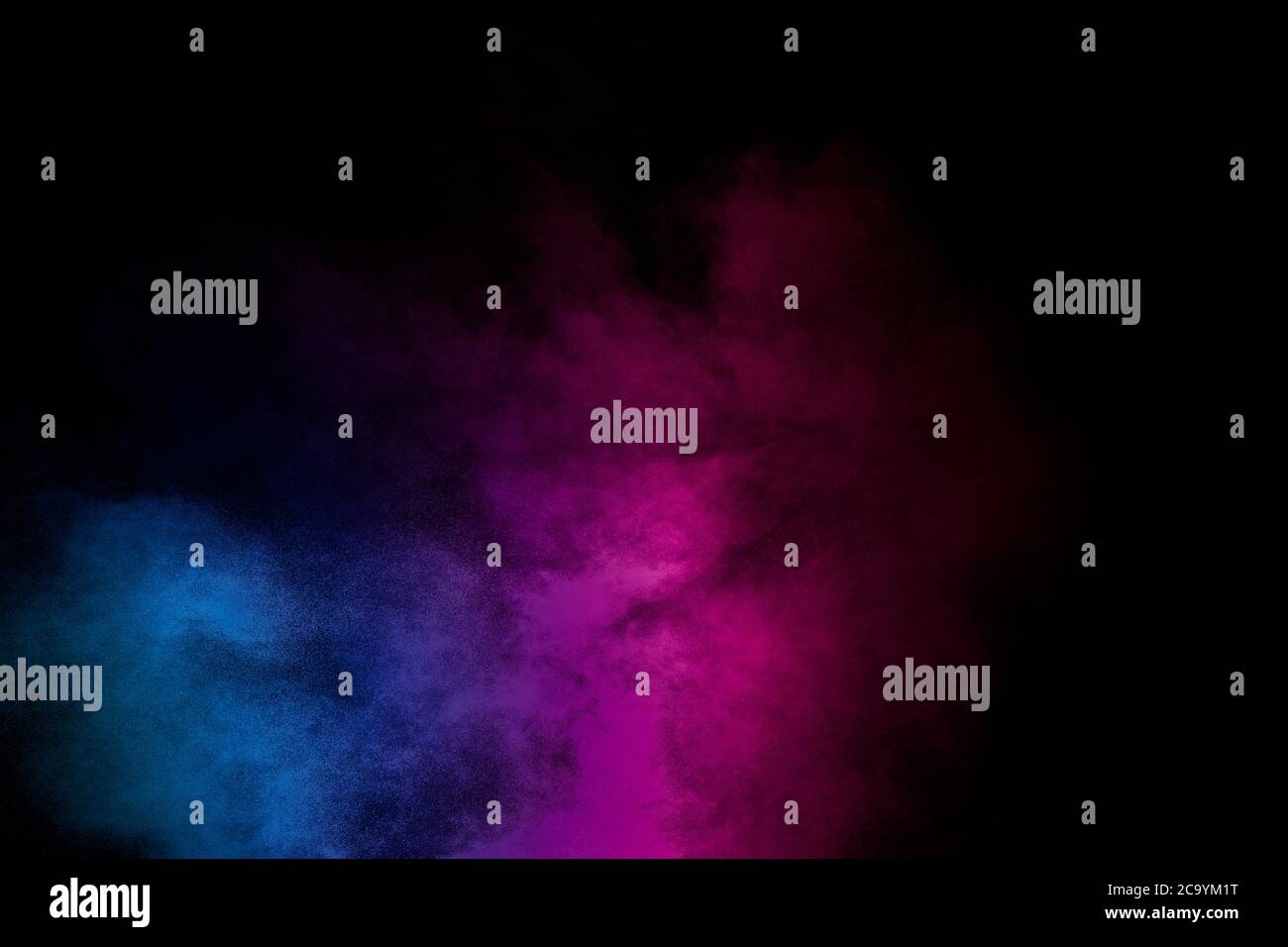 Pink blue dust particles splash on black background.Pink blue powder ...