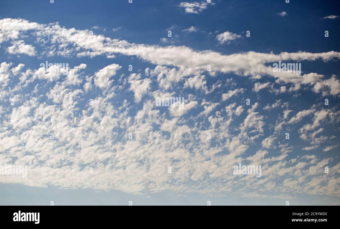 Cumulus cirrus cloud formation Stock Photo - Alamy