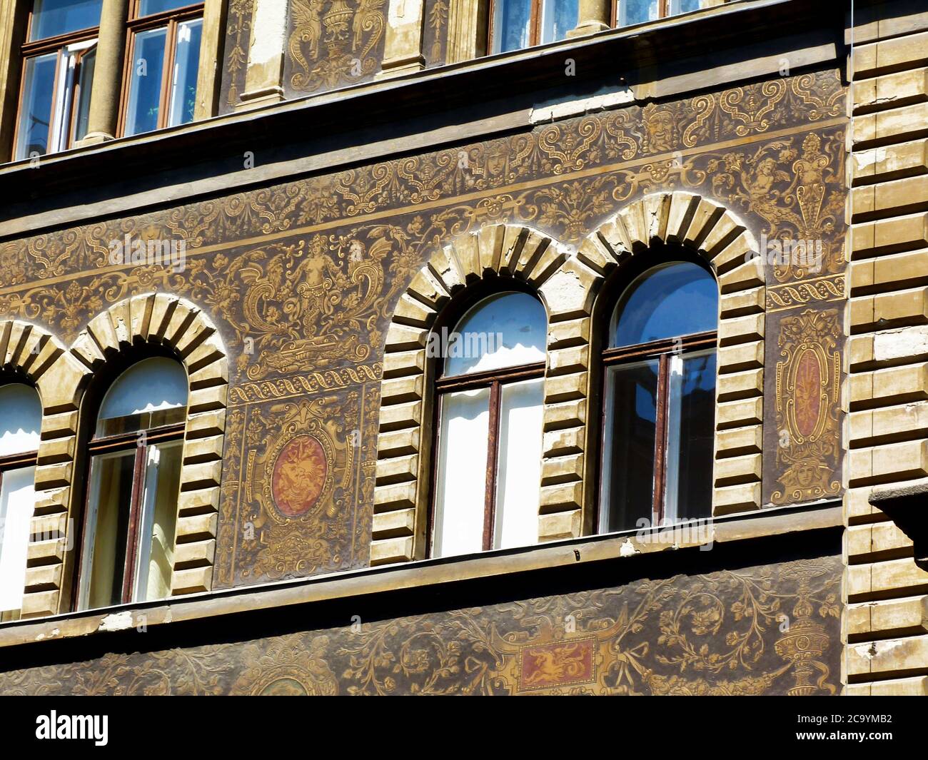 Beautiful old artistic yellow, golden and brown stucco neo renaissance ...