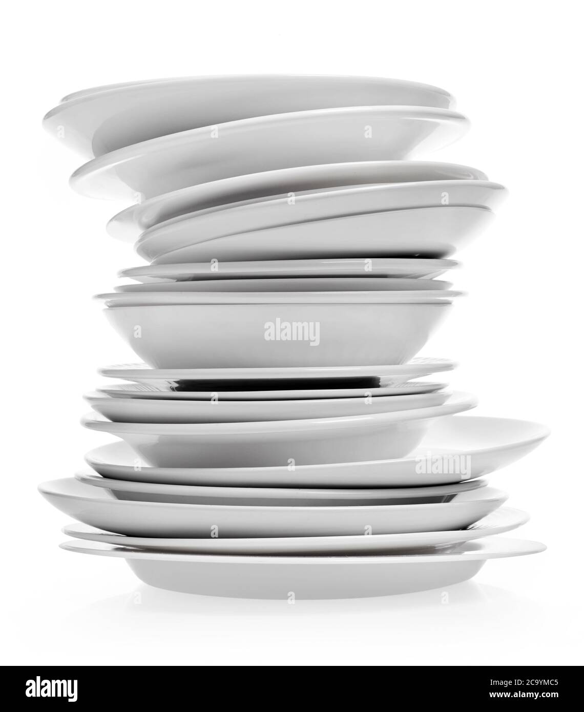 Clean plates stack isolated on white Stock Photo - Alamy