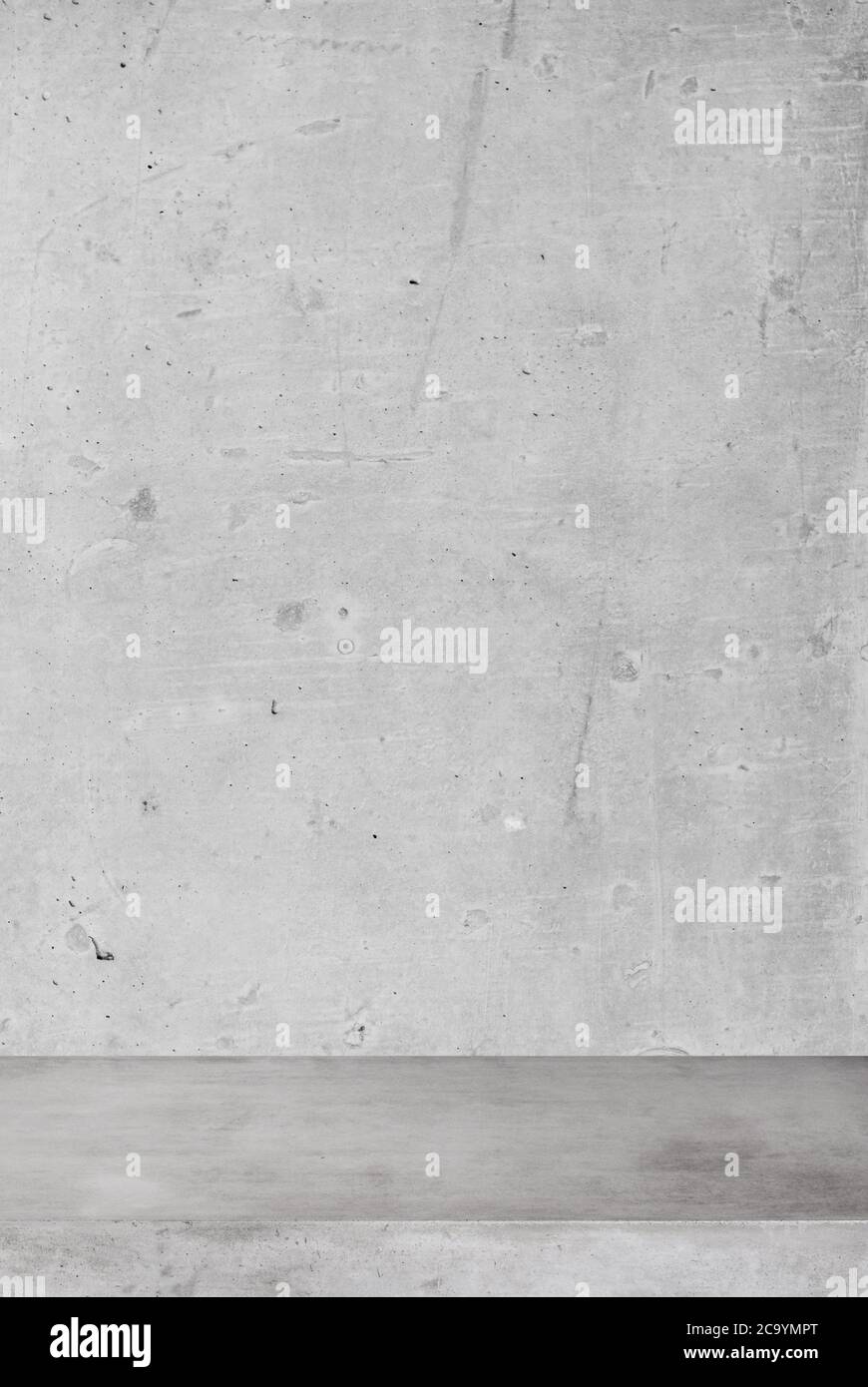 Gray concrete table and wall Stock Photo - Alamy