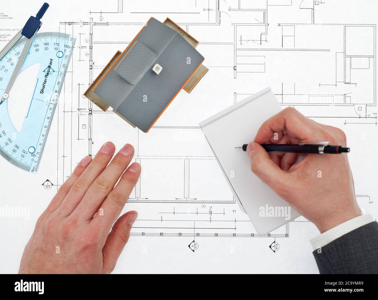 Architect taking notes Stock Photo - Alamy
