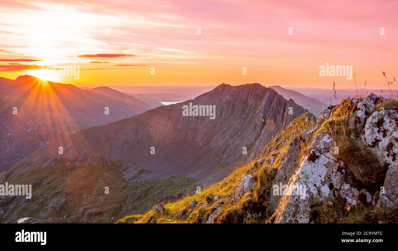 Sunset over Crib Goch, Snowdonia Stock Photo - Alamy