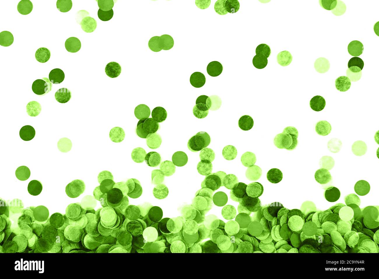 Festive green confetti background. Flat lay style Stock Photo - Alamy