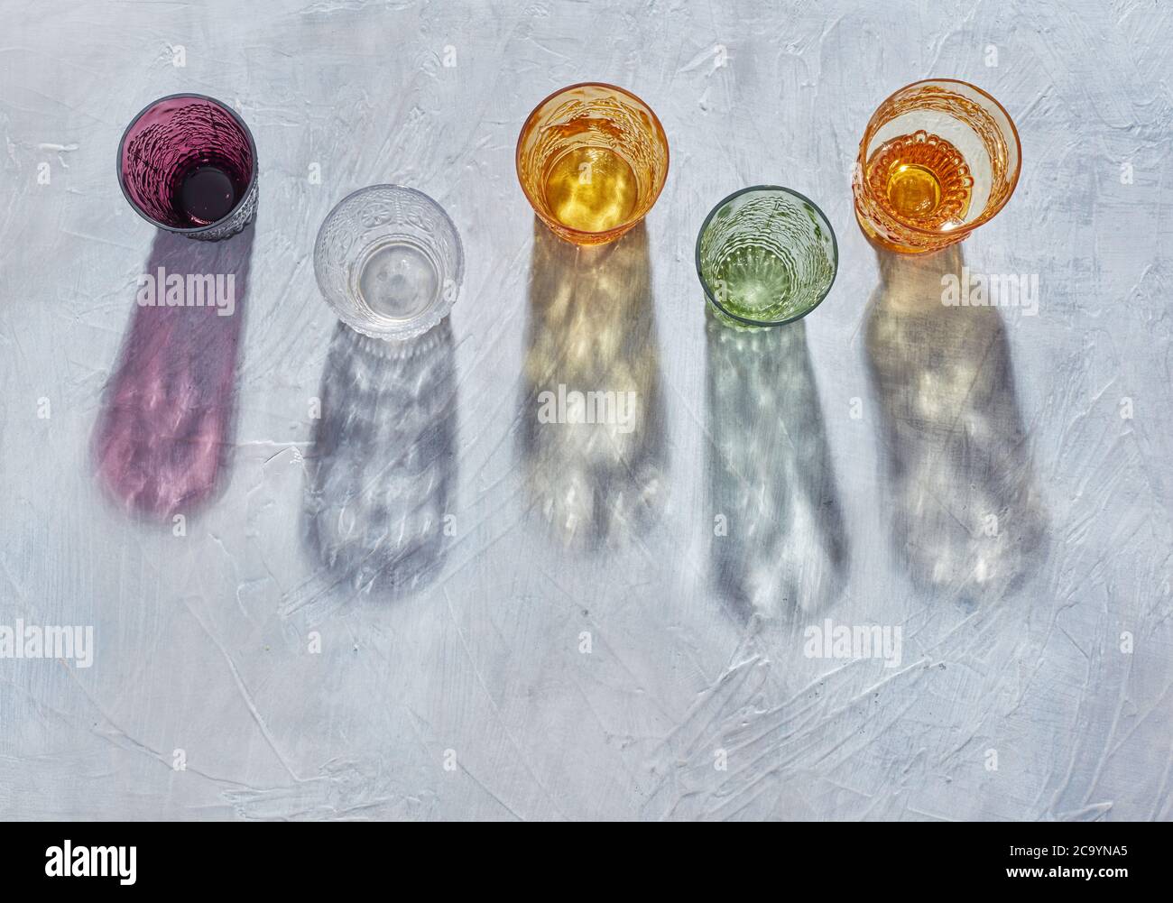 Multi-colored drinking glasses Stock Photo - Alamy