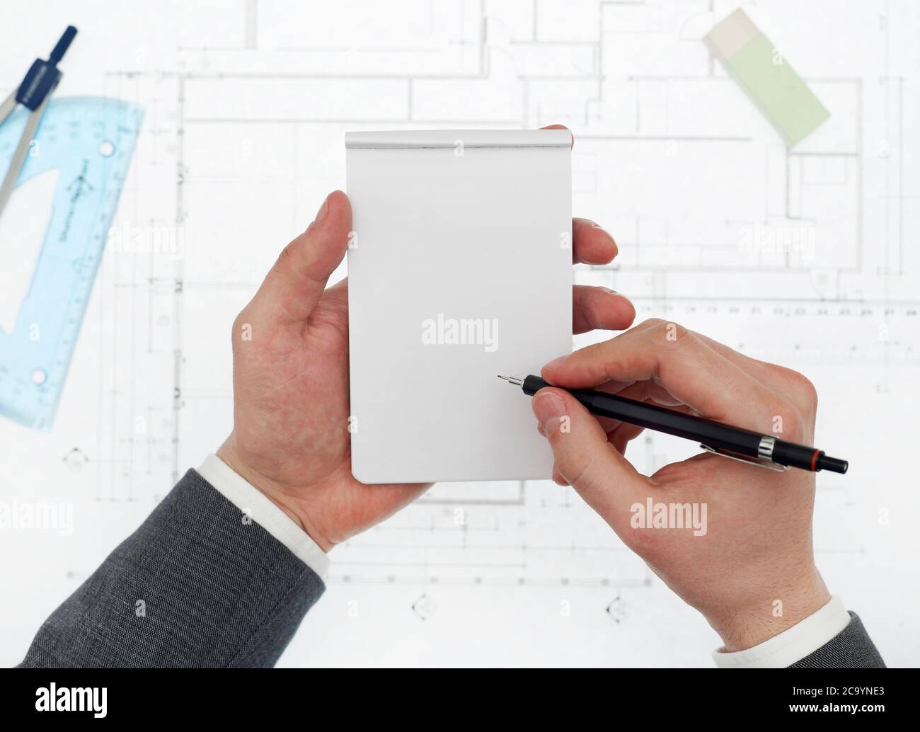 Engineer taking notes Stock Photo - Alamy