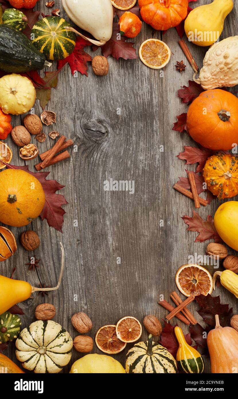 Pumpkins on wood background Stock Photo - Alamy