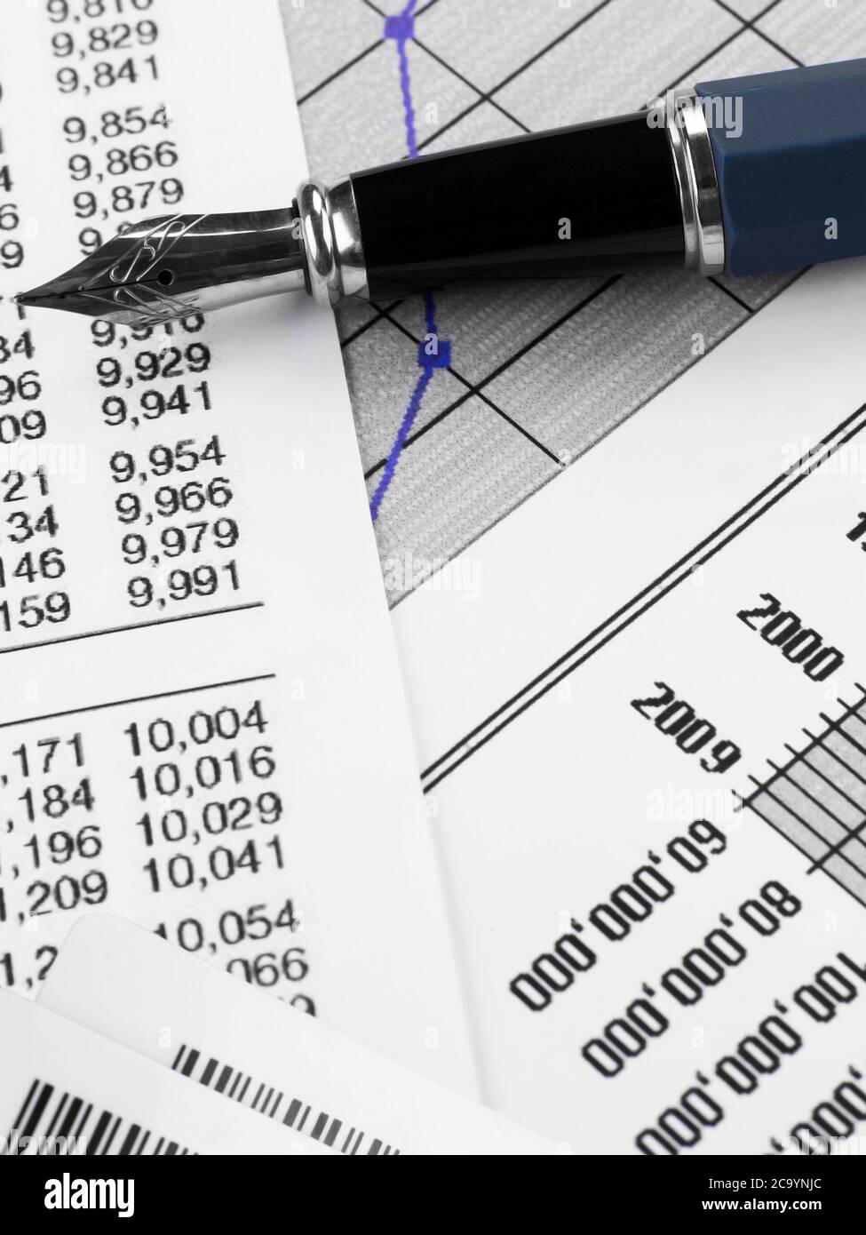 Financial papers, pen and calculator Stock Photo - Alamy