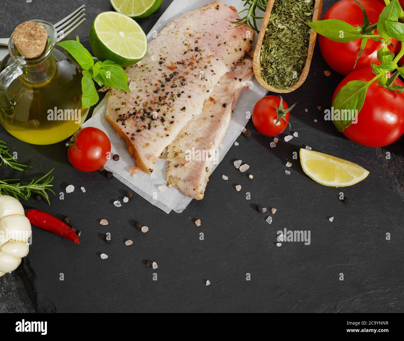 Fish fillet and seasoning Stock Photo - Alamy