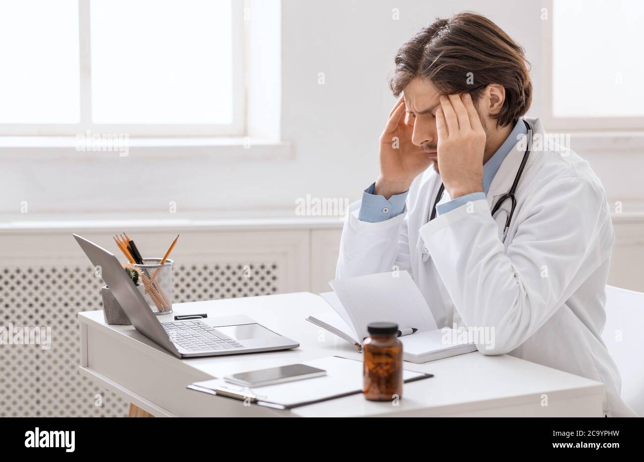 Doctor overwork hi-res stock photography and images - Alamy