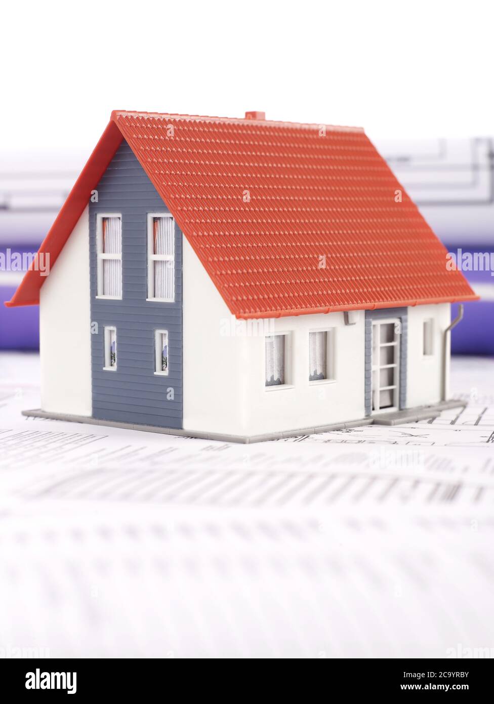 Model house and blueprints Stock Photo - Alamy