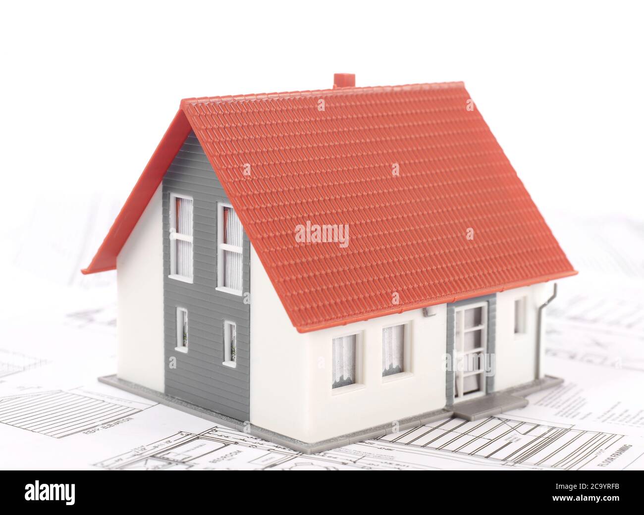 Model house and blueprints Stock Photo - Alamy