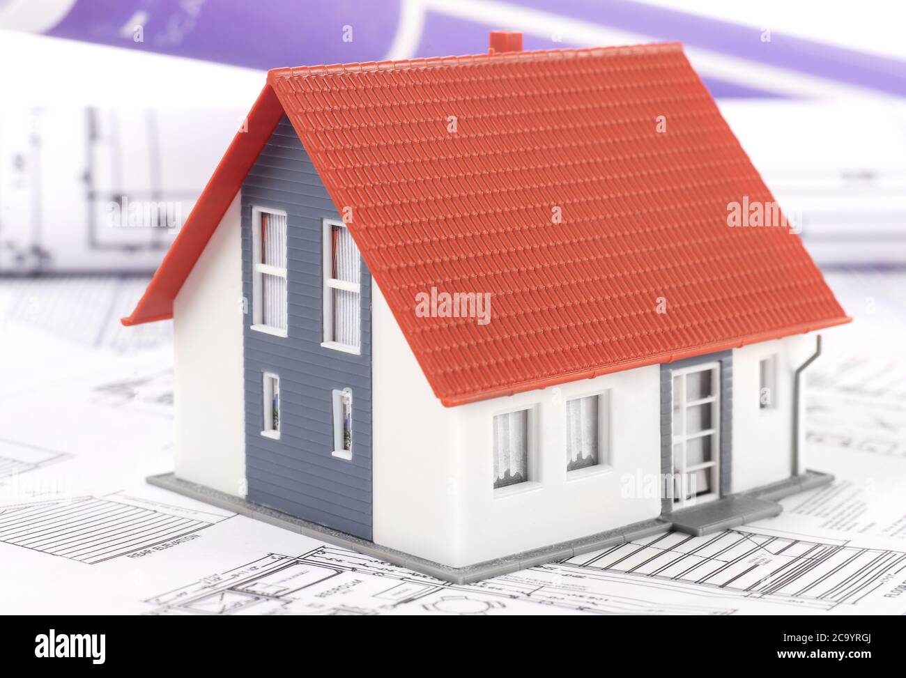 Model house and blueprints Stock Photo - Alamy