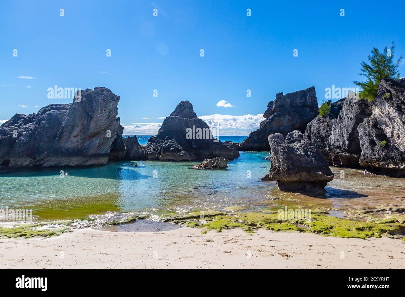 Rock formations in a pretty cove, on the island of Bermuda Stock Photo ...