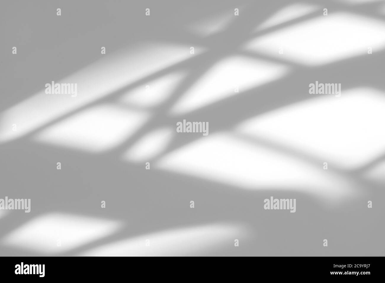 Organic drop shadow on a white wall Stock Photo - Alamy