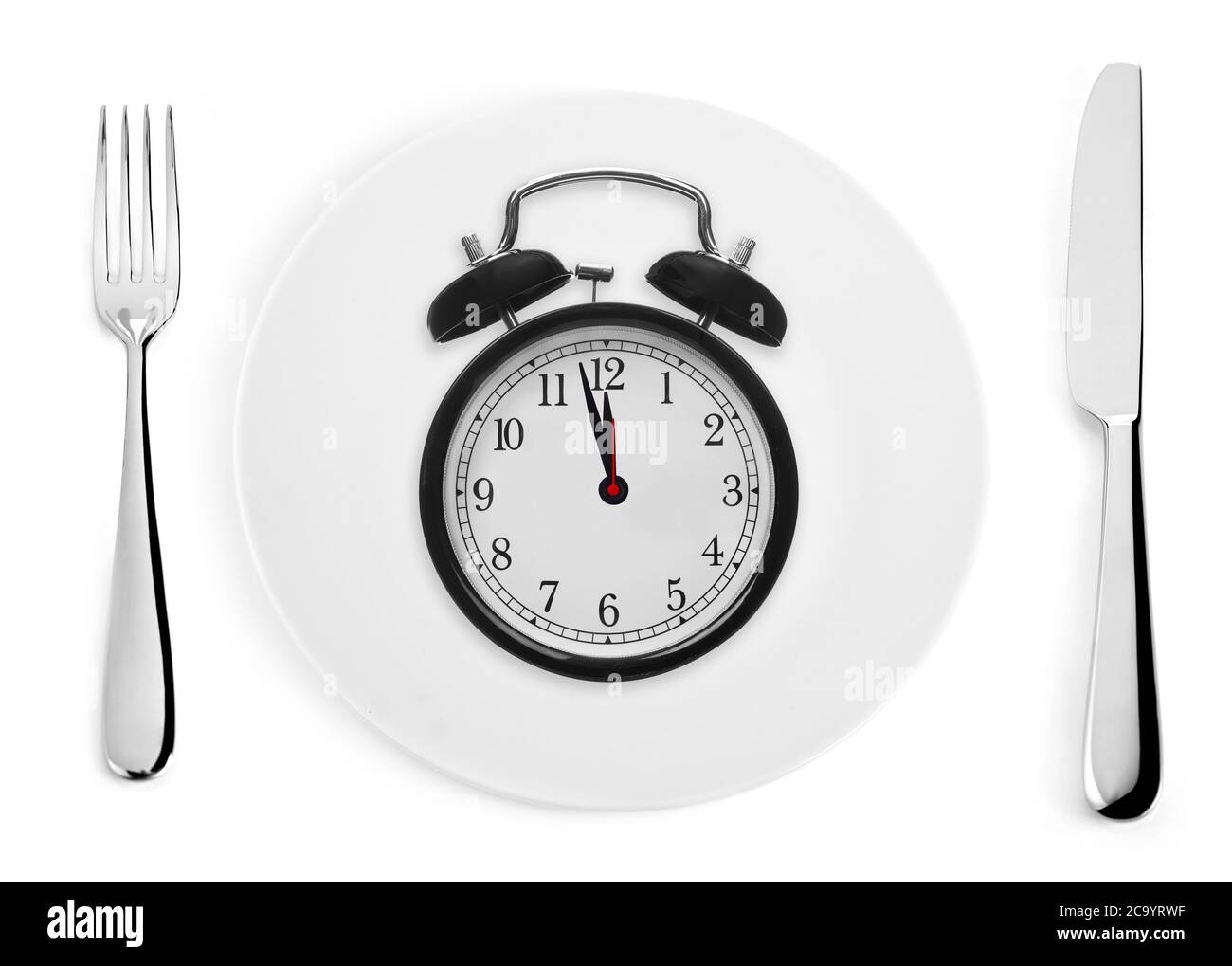 Clock and place setting isolated Stock Photo - Alamy