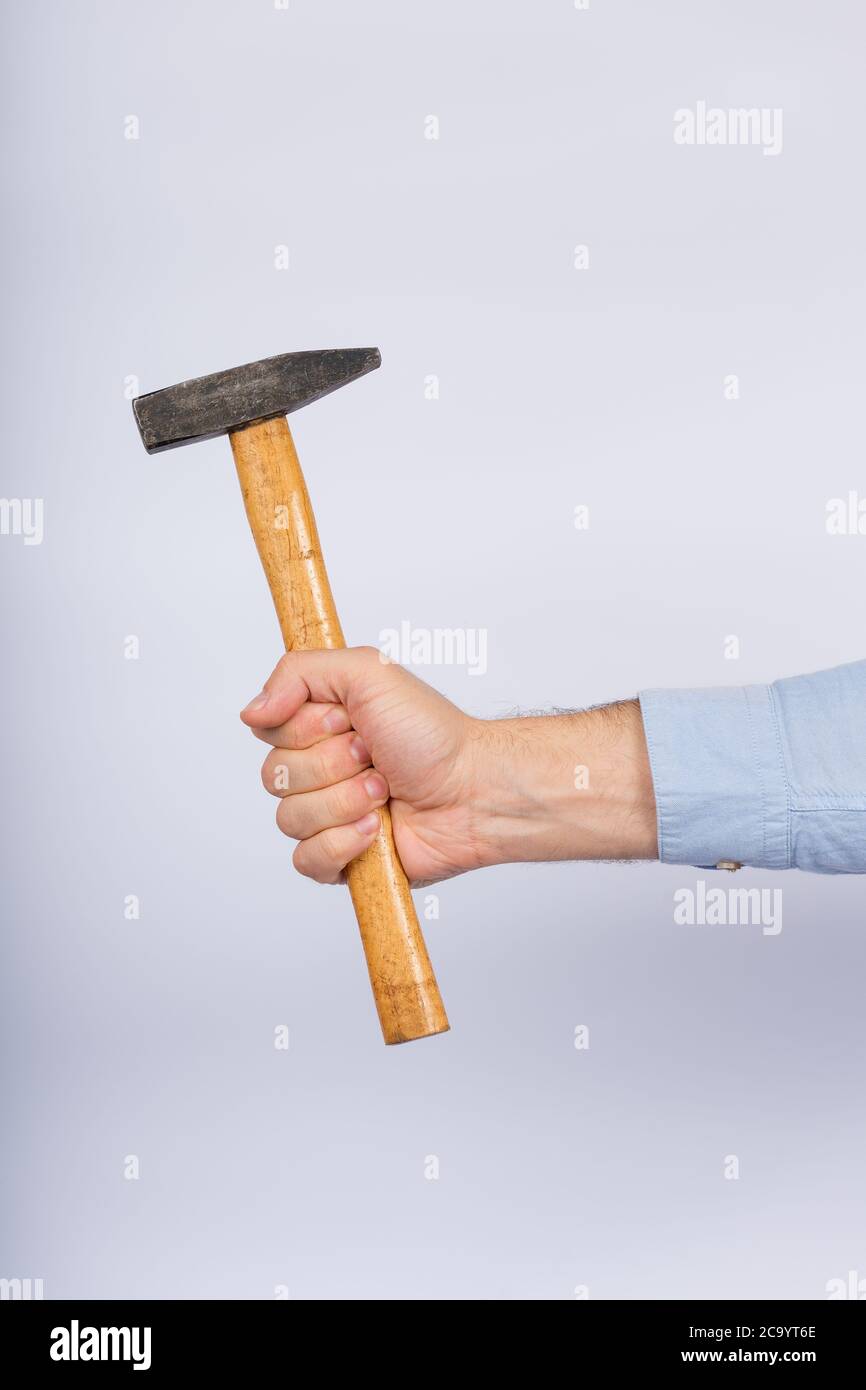 Male hand with hammer on white background. Claw hammer Side view Stock ...