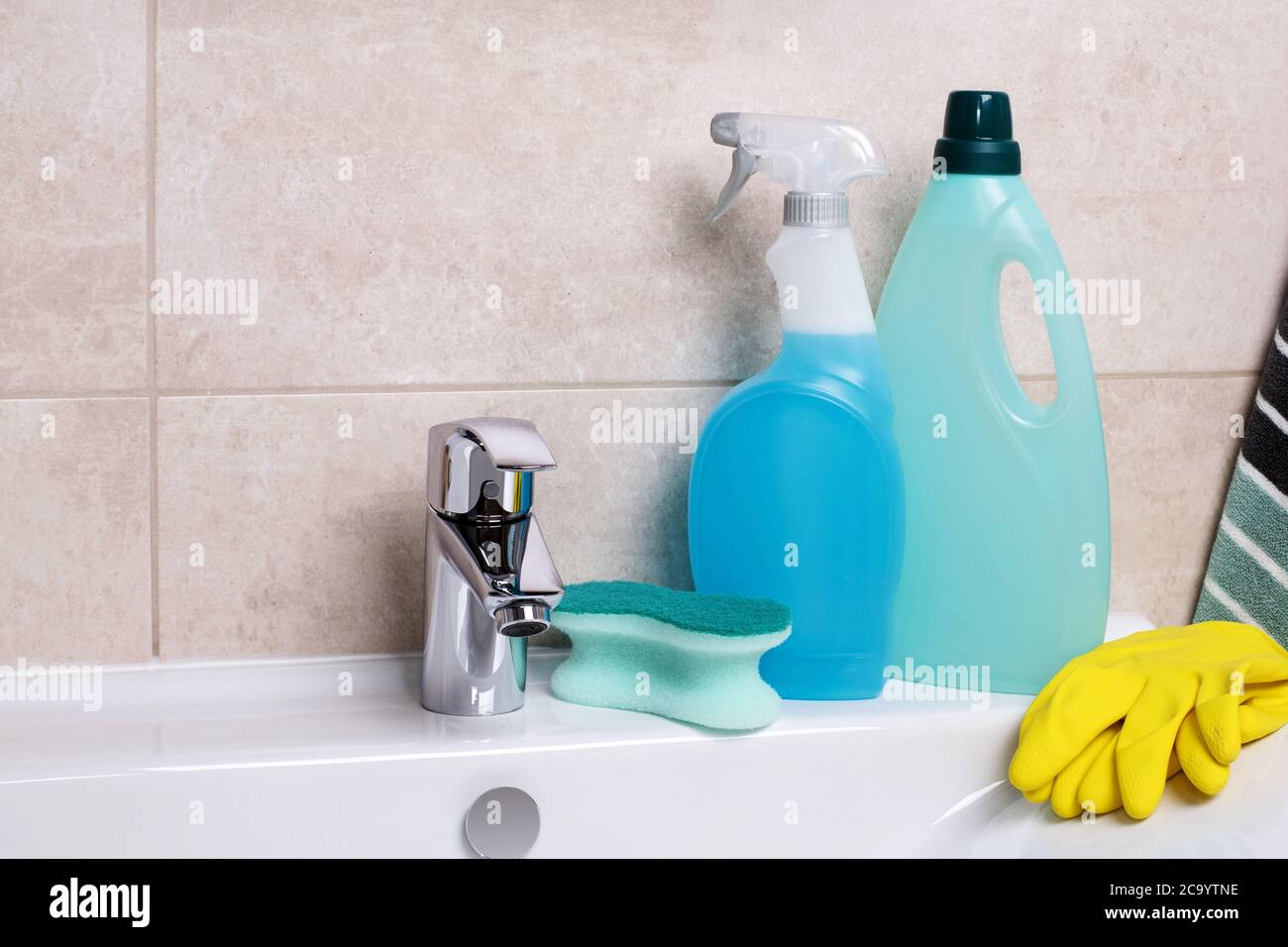 Cleaning equipment on bathroom sink Stock Photo - Alamy