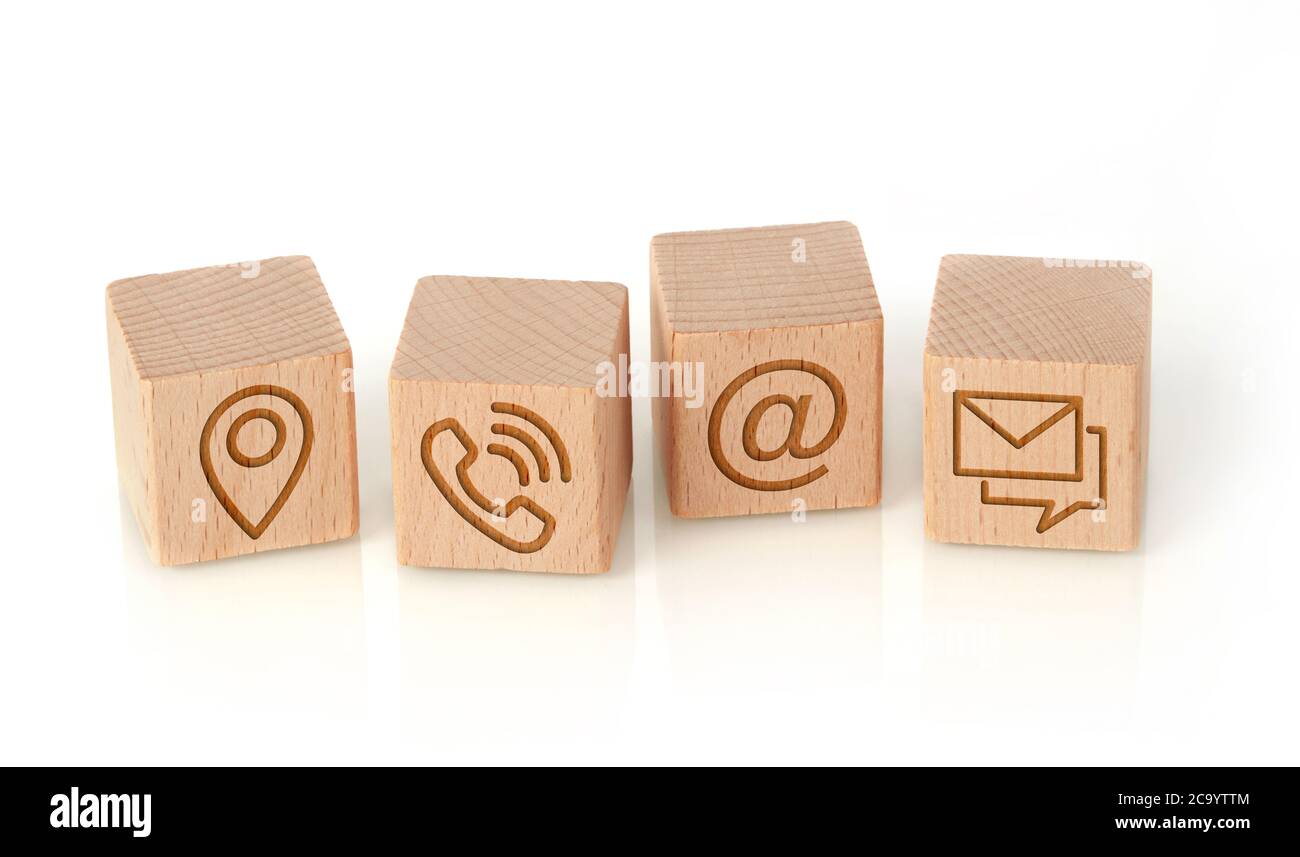 Symbols on wooden cubes-contact us concept Stock Photo - Alamy