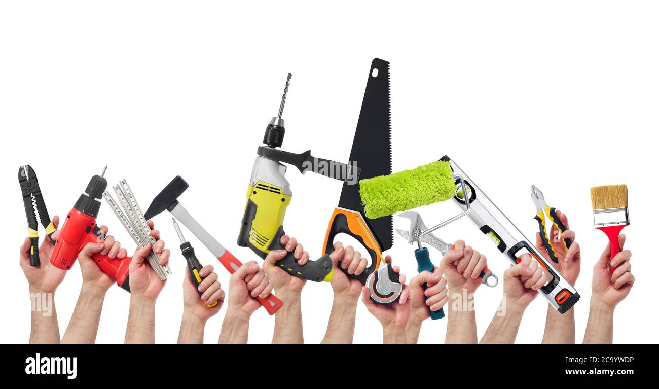 Hands with tools Stock Photo - Alamy