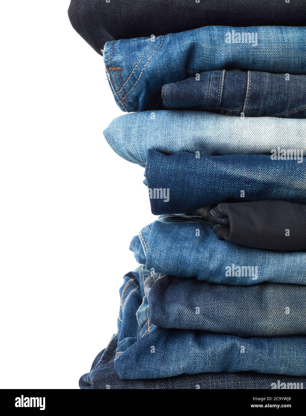 Jeans stack isolated on white Stock Photo - Alamy