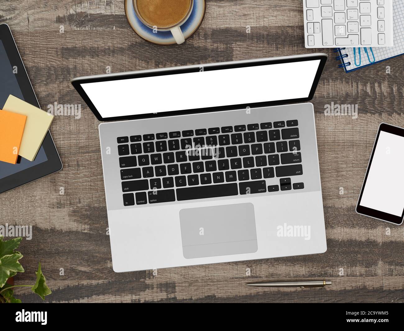 Laptop and office supplies Stock Photo - Alamy