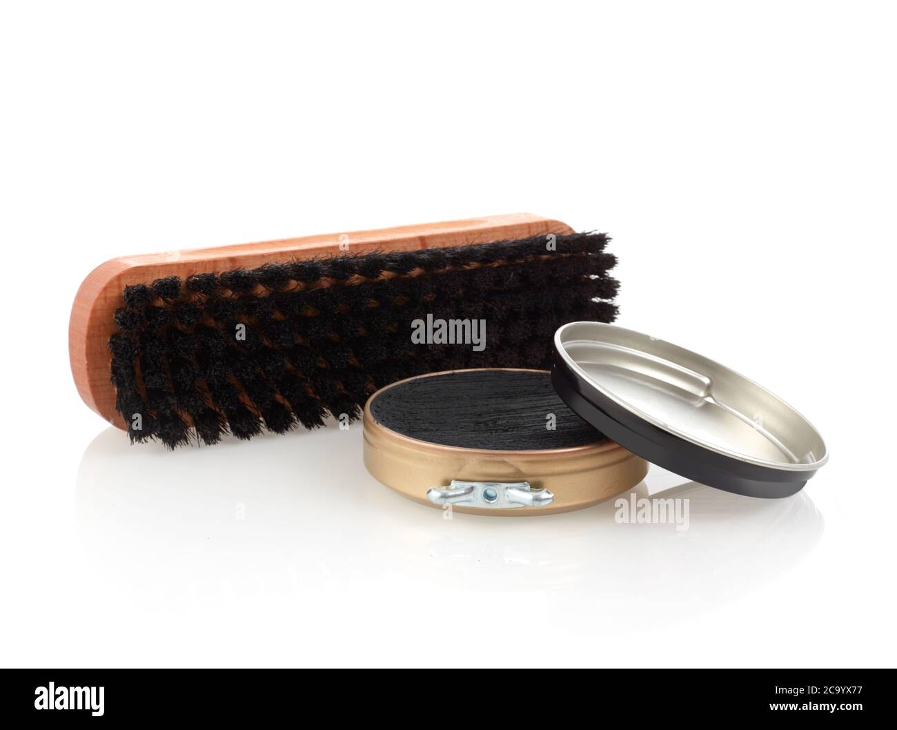 Shoe polish and shoe brush isolated Stock Photo - Alamy