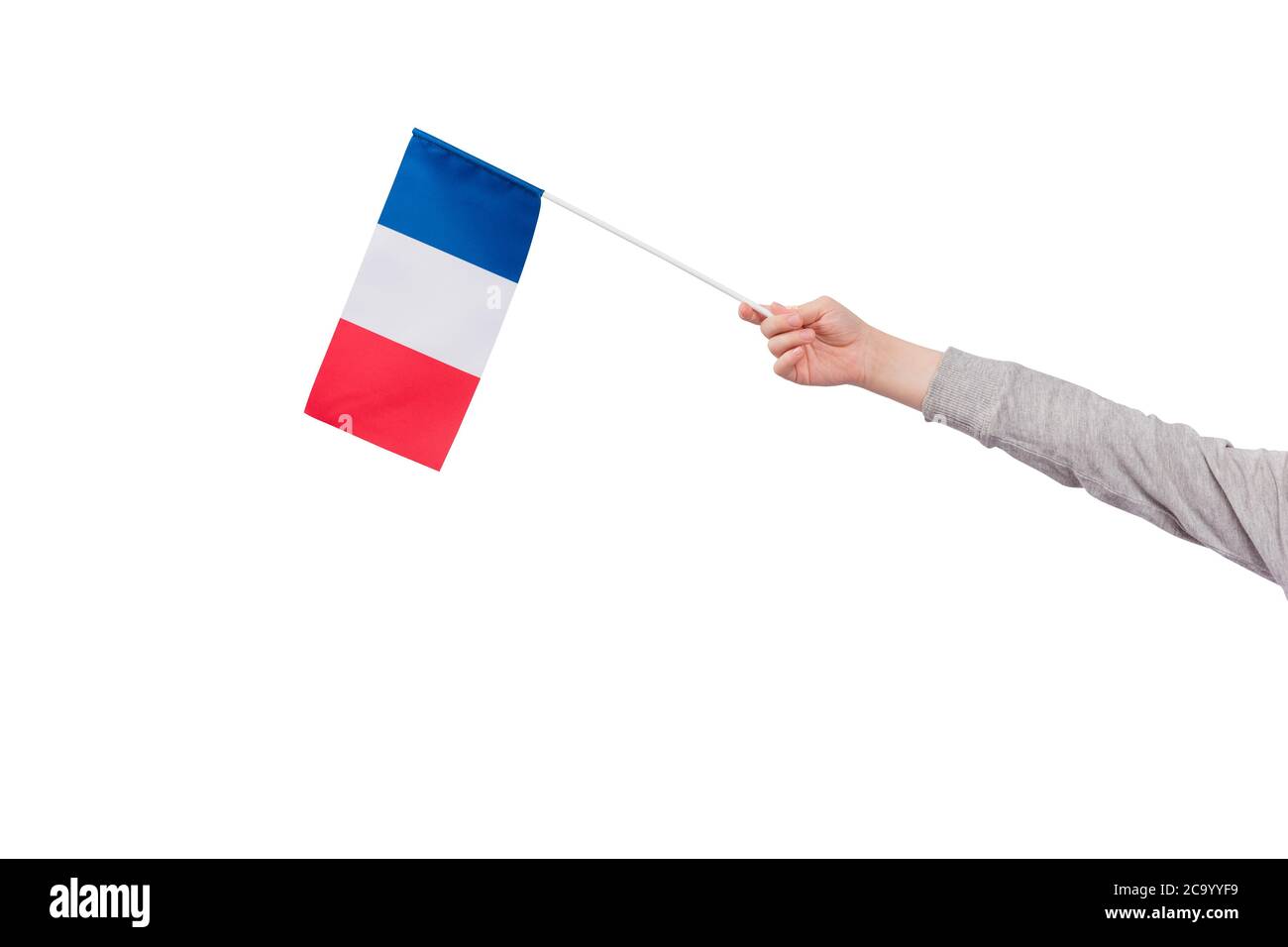 Flag of France in childs hand isolated on white background. Tri-color ...