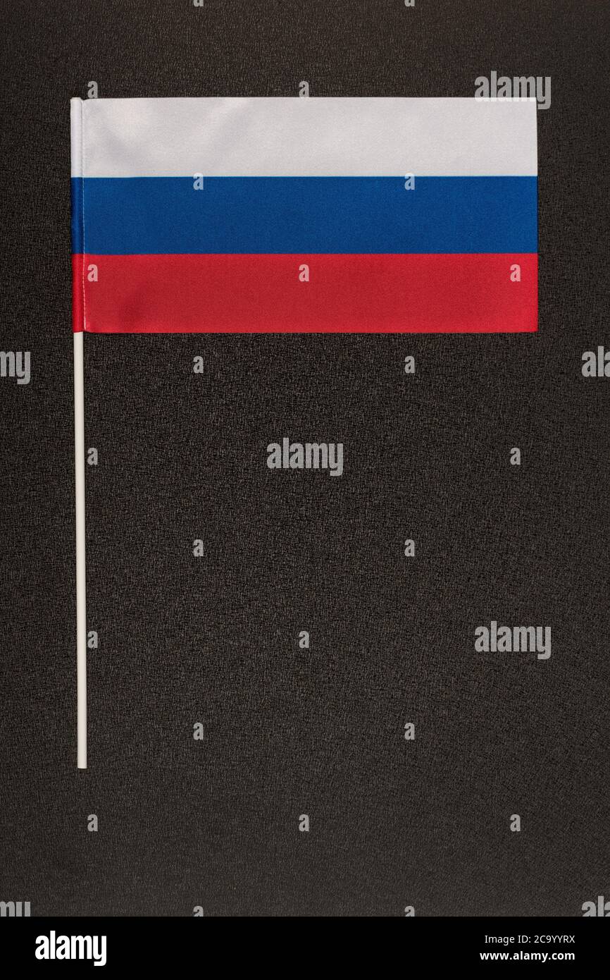 Flag of Russia on a black background. National symbol of Russia ...