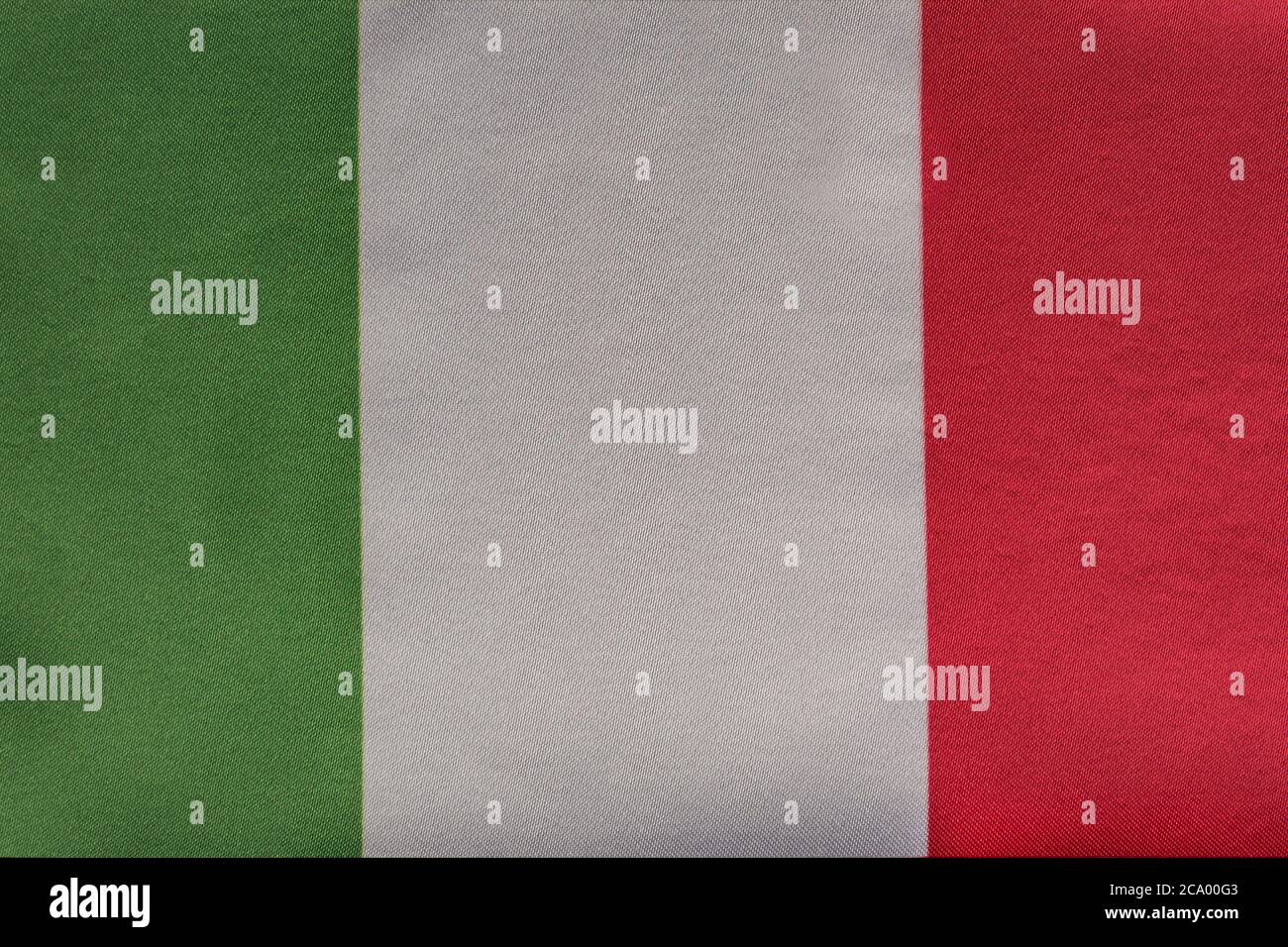 National emblem of Italy. Flag of the Italian Republic on close up ...