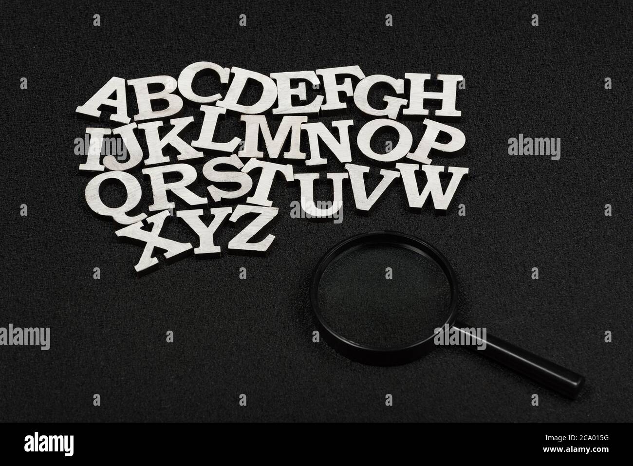 Latin letters in alphabetical order from A to Z. Black background ...
