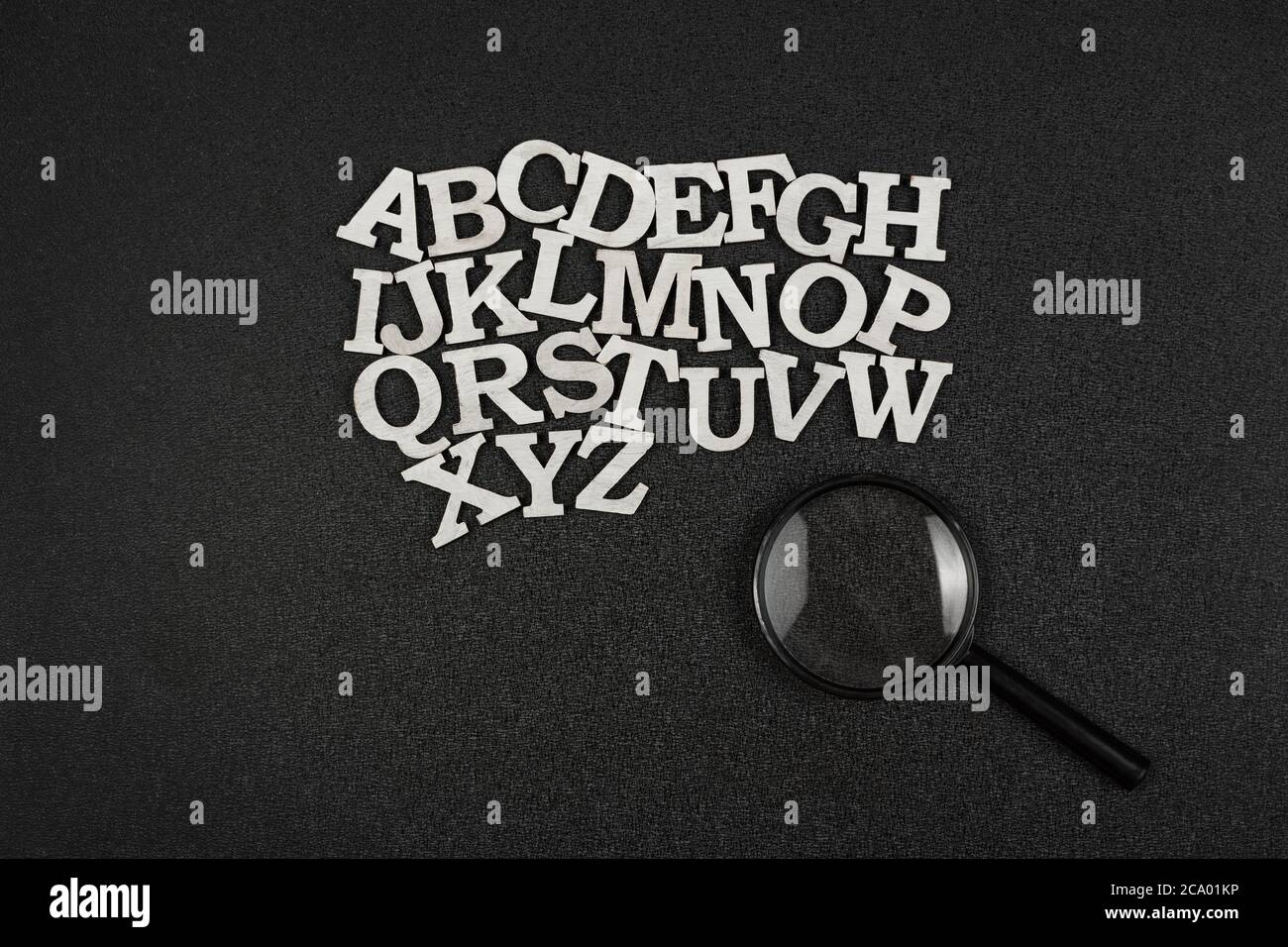 English letters in alphabetical order from A to Z on black background ...